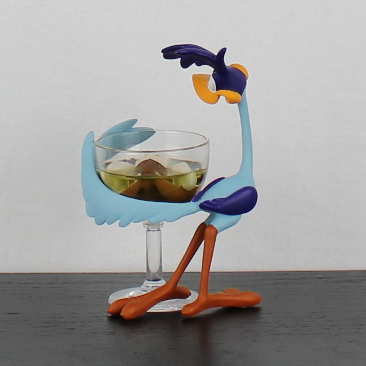 Vintage Road Runner with Wile E. Coyote in a glass figurine
