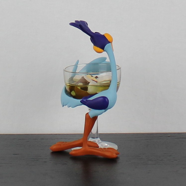 Vintage Road Runner with Wile E. Coyote in a glass figurine